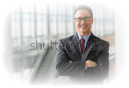 stock-photo-portrait-of-a-handsome-ceo-smiling-251320138 - Valomnia